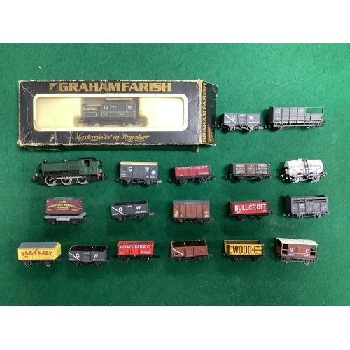 An N gauge GWR goods train comprising an 0-6-0 Pannier Tank, sixteen ...