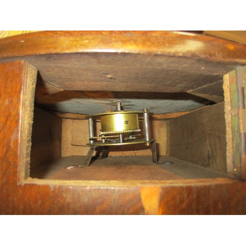 Duncan Dundee Wall Clock and a Wildex Mantel Clock