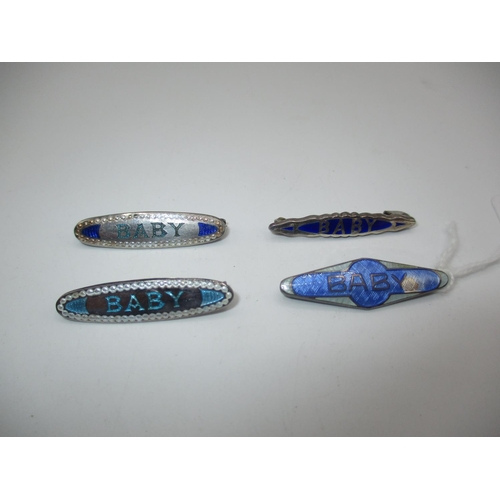 Four Silver and Enamel Baby Brooches