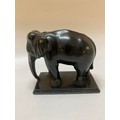 A polished slate model of an Indian elephant, on rectangular base - 5in ...