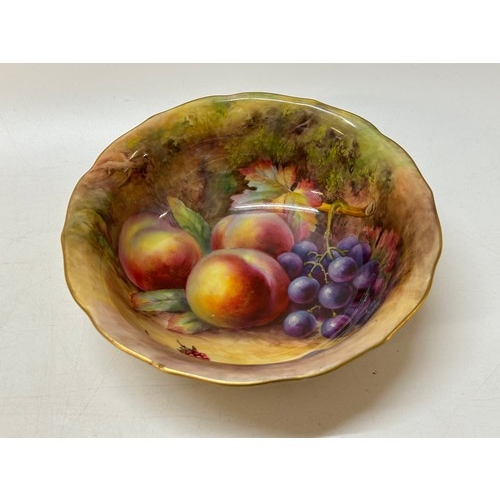 A Royal Worcester bowl painted fruit to the centre signed T Lockyer ...