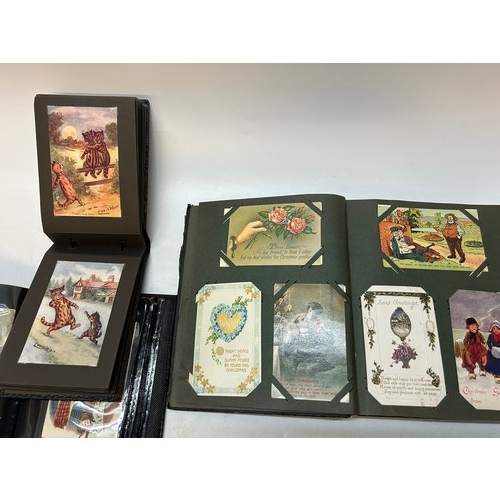 Three albums of postcards including humorous, Donald Magill, RMS ...