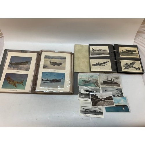 A collection of coloured and black and white postcards, many in albums ...
