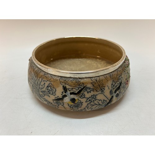 A Victorian Doulton Slater pottery salad bowl with plain silver rim ...