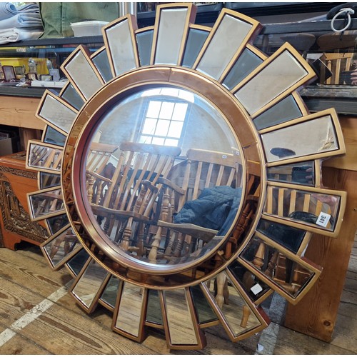 Modern sunburst sectional wall mirror approx. 109cm in diameter