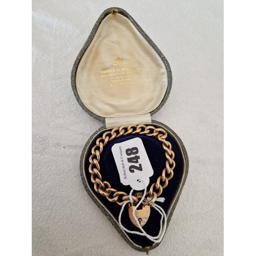 A ladies 9ct gold chain link bracelet, with heart shaped lock clasp in ...