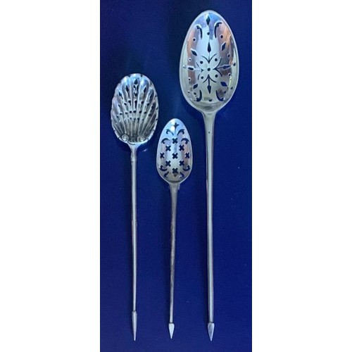Three 19th century silver Mote spoons, the largest with engraved ...