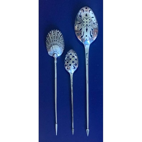 Three 19th century silver Mote spoons, one with engraved and quatrefoil ...