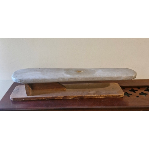 Early mid 1900s tailors sleeve press.