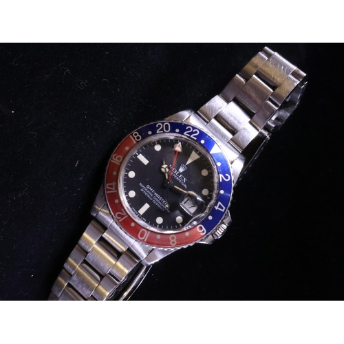 Rolex GMT-Master 16750 Wrist watch, the watch has the iconic Pepsi dial ...