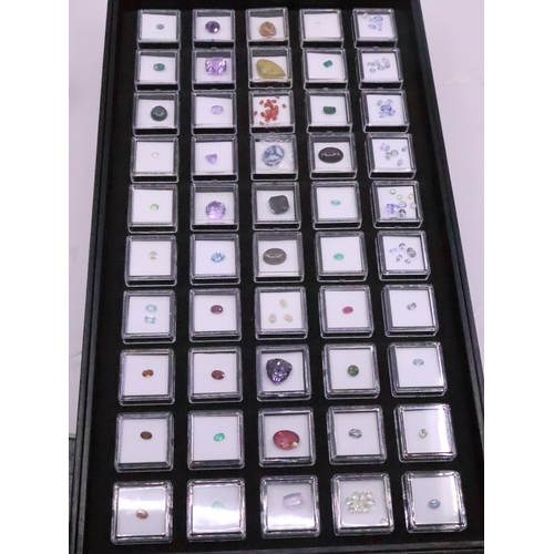 A collection of loose gem stones