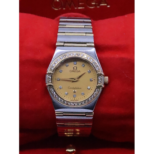 A diamond set Omega constellation wrist watch in box (With extra links)
