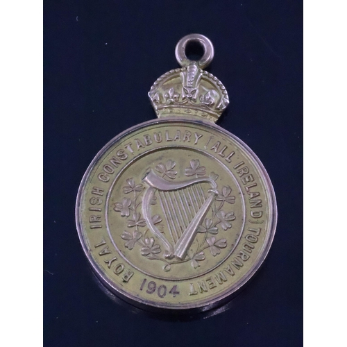 A 9ct gold medal: Royal Irish Constabulary All Ireland Tournament 1904 ...
