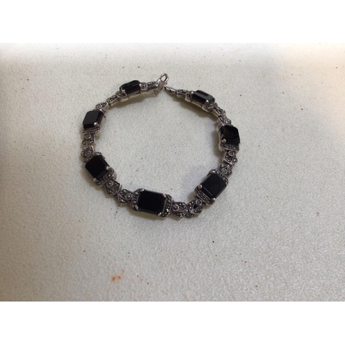 A silver marquesite bracelet and brooch and other white metal ...