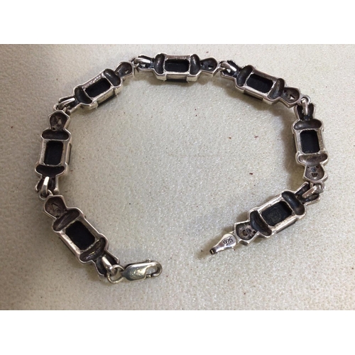 A silver marquesite bracelet and brooch and other white metal ...