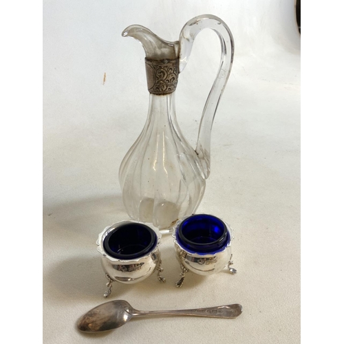 A Pair of silver salts with liners also with a silver spoon and a ...