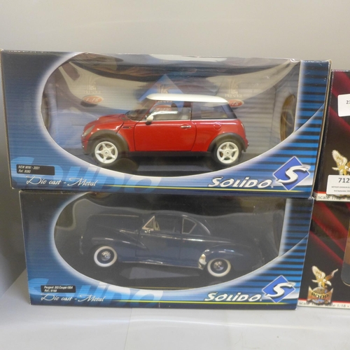Two Solido 1:18 scale, and two Road Signature model cars, boxed