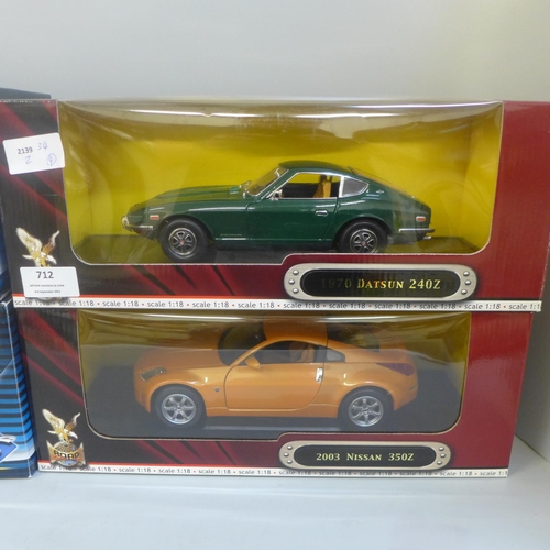 Two Solido 1:18 scale, and two Road Signature model cars, boxed