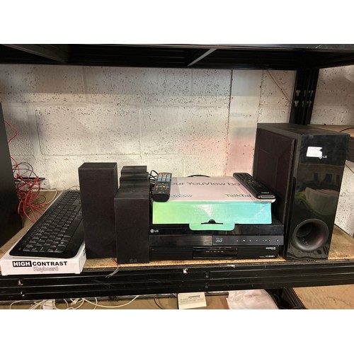 LG Blue Ray player and Humax DVD player with surround sound system