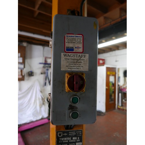 A Tecalemit Twintec MK5 2.5 tonne two-post automotive vehicle lift, cat ...