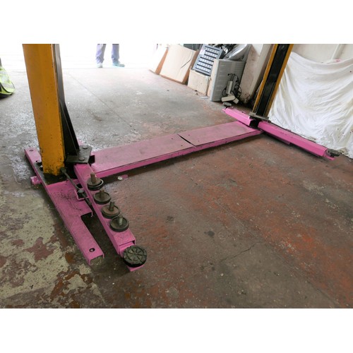 A Tecalemit Twintec MK5 2.5 tonne two-post automotive vehicle lift, cat ...