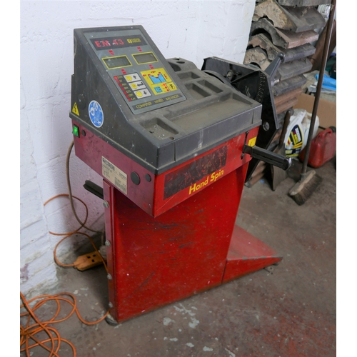 A Corghi EM 43 computer wheel balancer for cars, vans and motorcycles ...