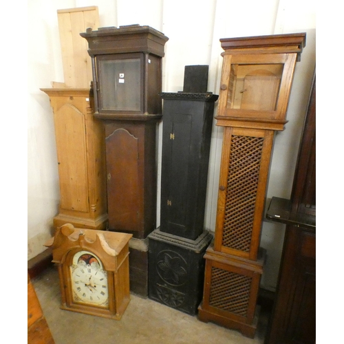 Three oak longcase clock cases and a pine longcase clock case