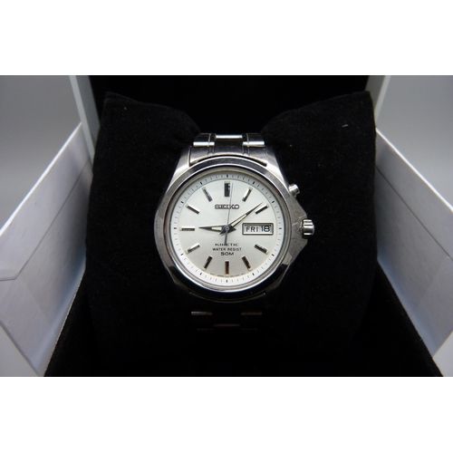 A Seiko Kinetic 50m day/date wristwatch, with box