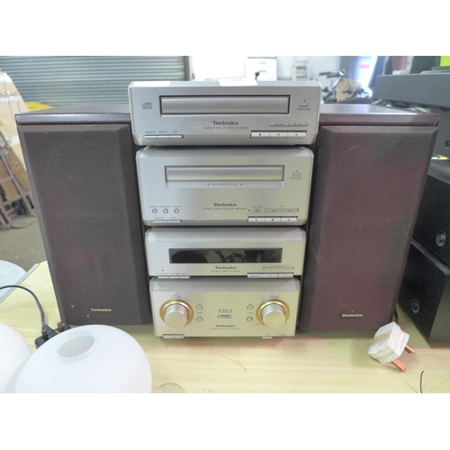 A Technics hi-fi system including stereo amplifier - SE - HD350, stereo ...