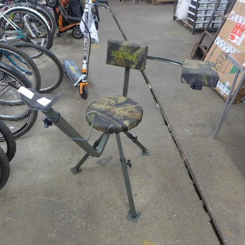 A Nitehawk swivel shooting chair
