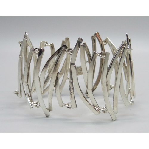 A designer silver bracelet by Joid'art, (tests as silver), 43g