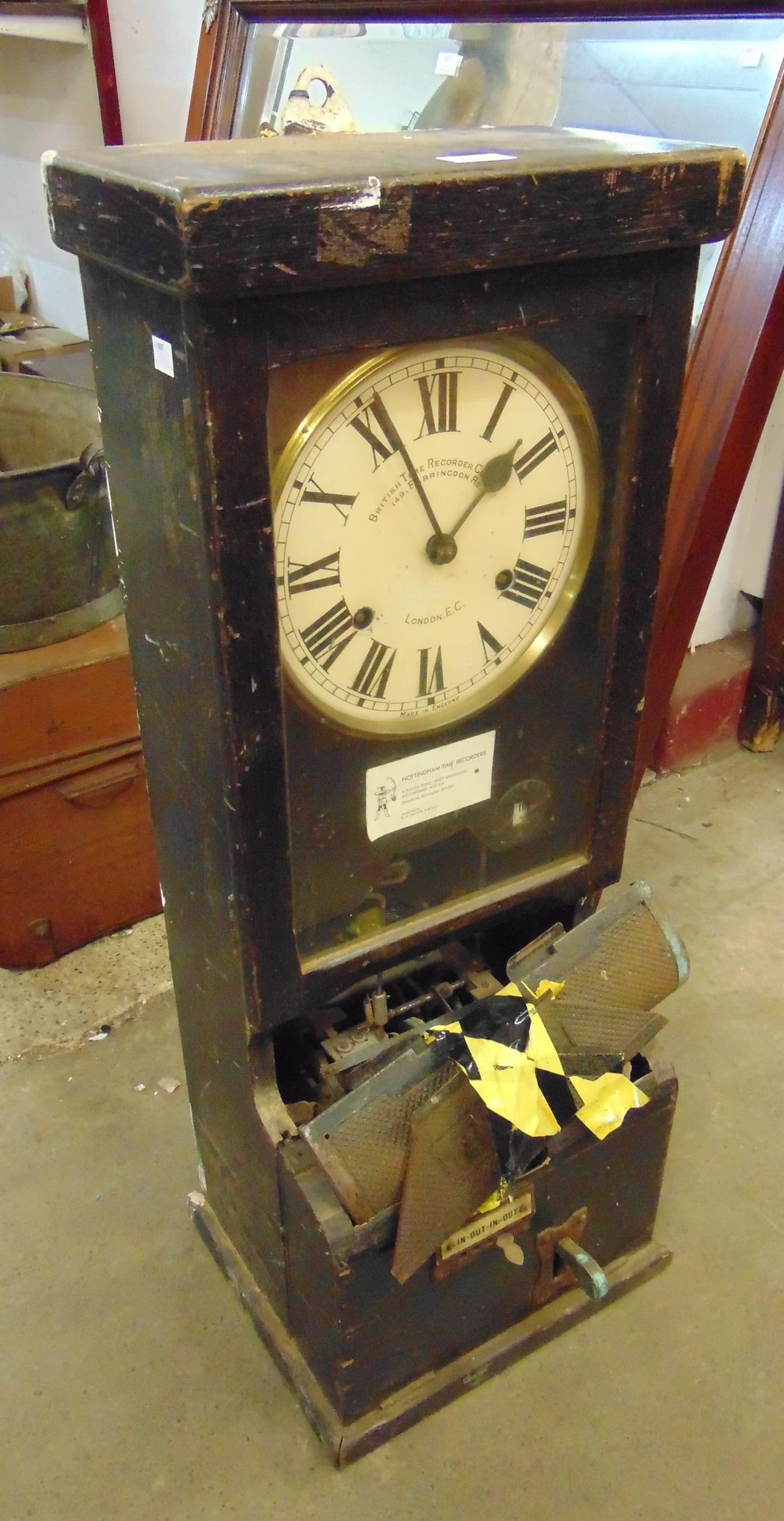 An oak cased oak time recording clock; Time Recorder Co. 149 ...