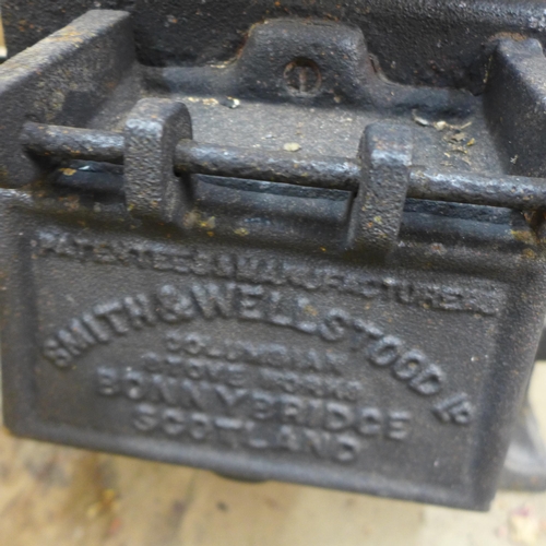 A Smith & Wellstood Ltd. cast iron belly pot stove