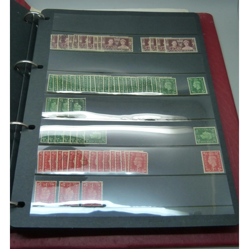 Stamps; two albums of used stamps, catalogued and mint commemoratives