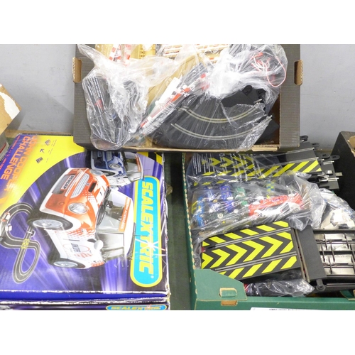 A Scalextric Mini Car Racing Set, a large amount of track and fencing ...