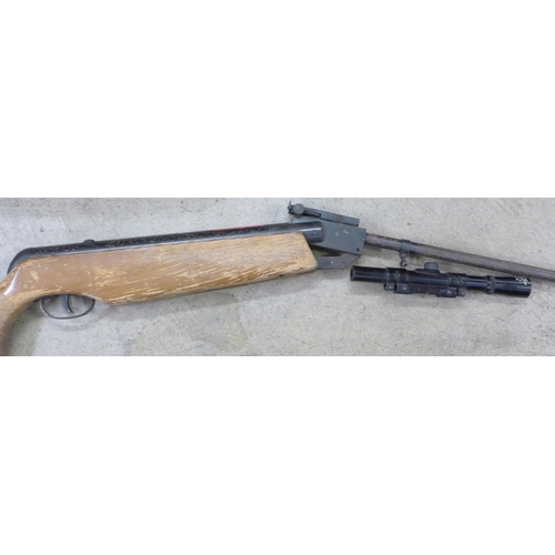 A .22 Superfire Power Magnum air rifle by ASI and an ASI 4 x 20 scope