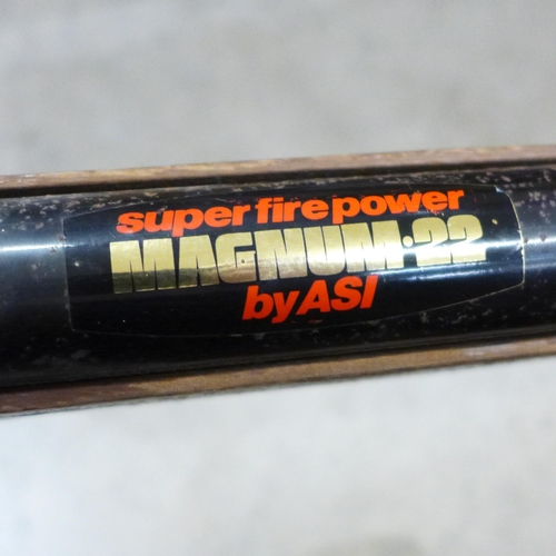 A .22 Superfire Power Magnum air rifle by ASI and an ASI 4 x 20 scope