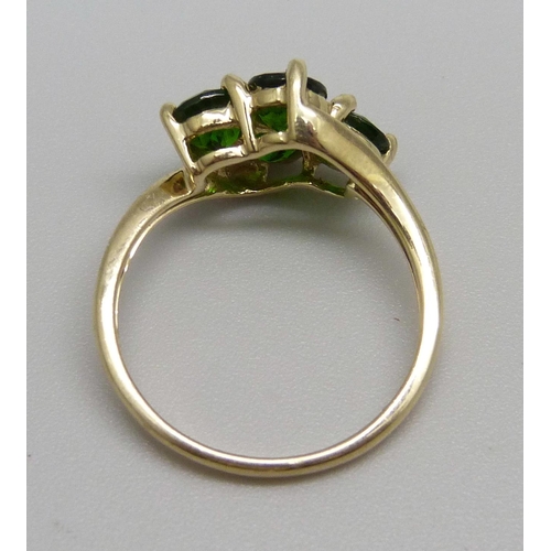 A 9ct gold and four stone Russian diopside ring, 2.6g, O