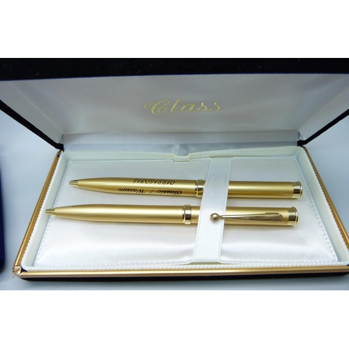 Three gold tone pens/pen sets, Caran d'ache; Class and ITC.