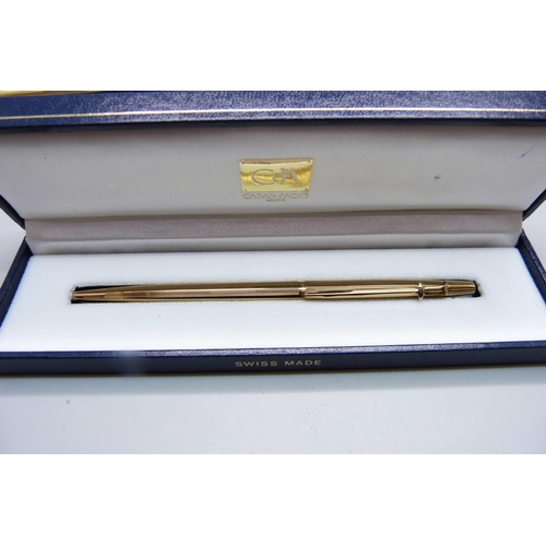 Three gold tone pens/pen sets, Caran d'ache; Class and ITC.