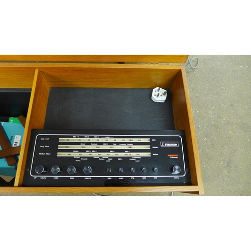 A vintage Ferguson model no.3371 radiogram with turntable, record ...