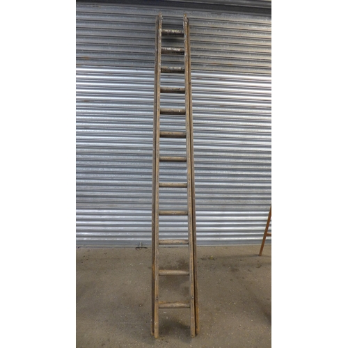 3 Wooden ladders; a 6-rung step ladder, a 7-rung step ladder and a 12 ...