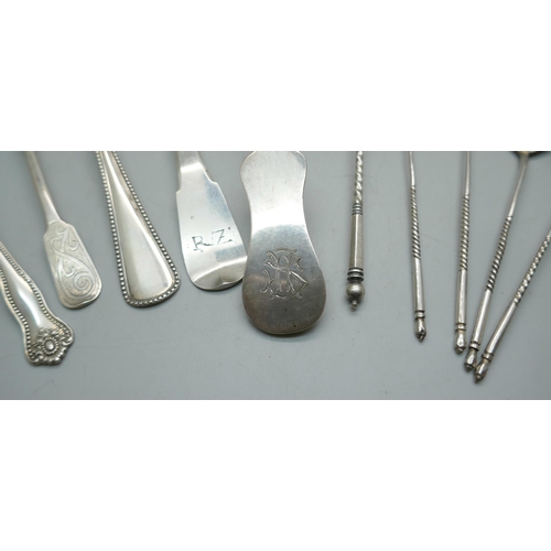 Nine spoons; ladle with continental control mark, two large spoons with ...