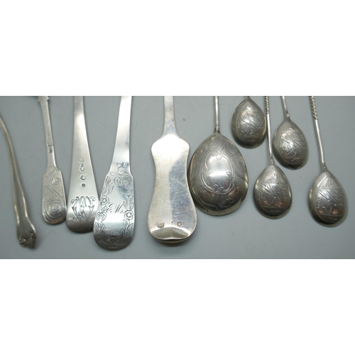 Nine spoons; ladle with continental control mark, two large spoons with ...