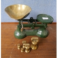 A set of Victor weighing scales with graduated brass weights