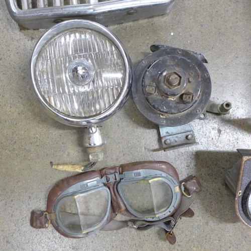 A collection of car parts, Castrol gold helmet, two pairs of driving ...