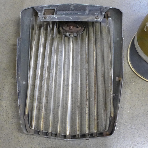 A collection of car parts, Castrol gold helmet, two pairs of driving ...