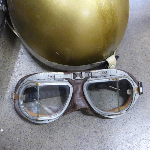 A collection of car parts, Castrol gold helmet, two pairs of driving ...