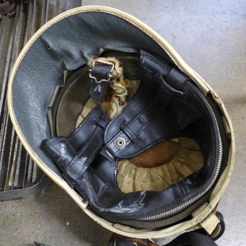 A collection of car parts, Castrol gold helmet, two pairs of driving ...