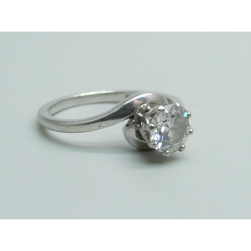 A platinum and diamond solitaire ring, with certificate, 0.72 carat ...